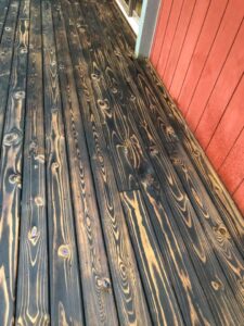 DIY Burnt Wood Deck - The Happy Farmhouse